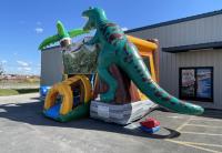 China Experience the Thrills of the Dinosaur Era with Our Inflatable Bounce House and Slide for sale