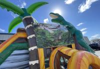 China Experience the Thrills of the Dinosaur Era with Our Inflatable Bounce House and Slide for sale