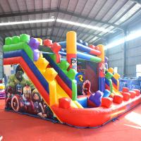 China PVC 23ft Crossover Building Block Castle Inflatable Bounce House with Slide and Blower for sale