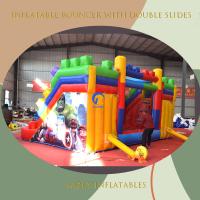 China PVC 23ft Crossover Building Block Castle Inflatable Bounce House with Slide and Blower for sale