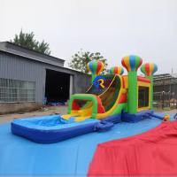 China Kids' PVC tarpaulin inflatable castle slide set with colorful balloons and bounce house for sale