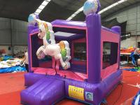 China Digital Printing Rainbow Unicorn PVC Inflatable Purple Castle Commercial Bouncy Castle for sale