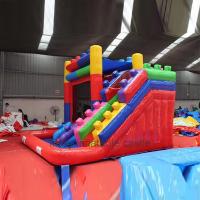 China Commercial Jumping Castle Combo with Inflatable PVC Building Blocks and Slide for sale