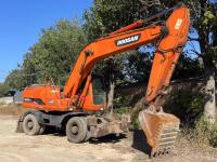 China Doosan Dh210w-7 Used Korea Used Wheel Loader Wheel Excavator 101kW for sale
