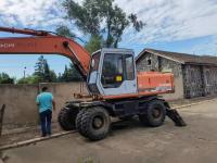 China Hitachi EX 160WD Used Wheel Excavator 102 kN 1.26m Bucket width for sale