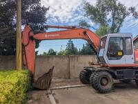 China Hitachi EX 160WD Used Wheel Excavator 102 kN 1.26m Bucket width for sale