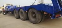 China Two-axle Lowbed Semi Trailer Featuring Low Ground Clearance And Strong Load-bearing Capacity for sale