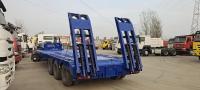 China Two-axle Lowbed Semi Trailer Featuring Low Ground Clearance And Strong Load-bearing Capacity for sale