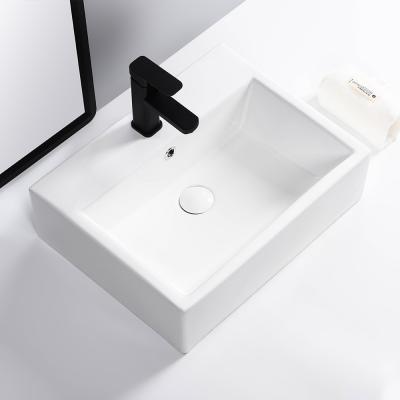 China New Design Small Size Ceramic Bathroom Wash Hand Basin Art Basin for sale