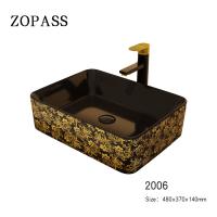China Black Gold Rectangle Ceramic Countertop Basin 560x410mm Single Hole Vessel Sink for sale
