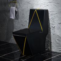 China One Piece Washdown Sanitary Ware Toilet Black Gold Graphic Design for sale