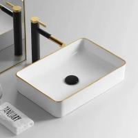 China Waterfall Black Basin Faucet With Golden Handle Hot And Cold Mixer for sale