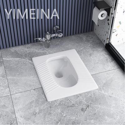 China Gravity Flushing Ceramic Squatting Pan Sanitary Ware Water Closet for sale