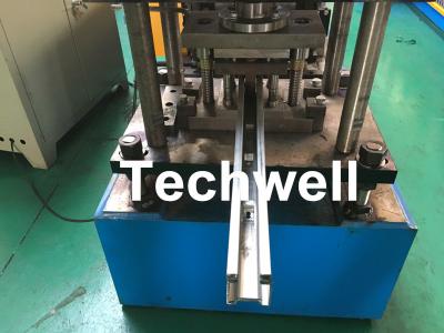 China Custom Made Sliding Shutter Door Guide Rail Roll Forming Line With Chain Drive for sale