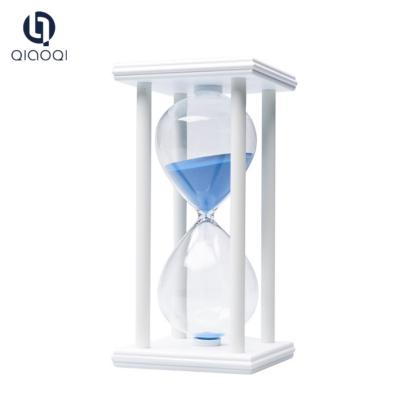 China Beautiful home and office decoration colorful hourglass with wooden frame for sale
