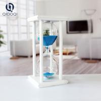 China Beautiful home and office decoration colorful hourglass with wooden frame for sale
