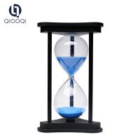 China High Quality Glass Colorful hourglass with three feet frame for sale for sale
