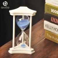 China High Quality Glass Colorful hourglass with three feet frame for sale for sale