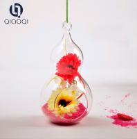 China The gourd shape oblique opening transparent glass vase for sale
