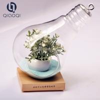 China Creative bulb shape hanging glass vase with wood base for sale