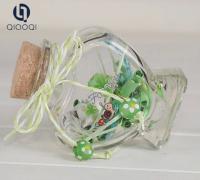 China 65ml Hot heart shape lucky star glass bottle for sale
