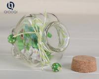China 65ml Hot heart shape lucky star glass bottle for sale
