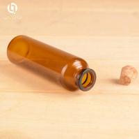 China 50ml brown color glass tube bottle with cork for sale