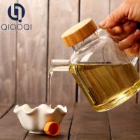 China Glass oil and vinegar cruet with bamboo lids for sale