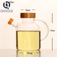 China Glass oil and vinegar cruet with bamboo lids for sale