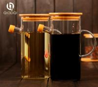 China kitchenware custom wholesale jar glass honey pot with handle glass oil dispenser for sale