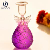 China Purple glass candle holder with angel shaped for sale