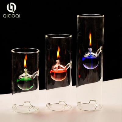 China Transparent cylinder glass oil lamp lotus candlestick used for wedding gift for sale