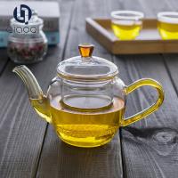 China Promotional gifts 400ml Glass Personalized Tea Pots With Colored Handle and Lid Made in China for sale