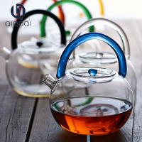 China New Style Handmade glass tea pot with color handle for sale