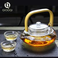 China 2018 heat resistant glass teapot tea pot with wooden handle for sale