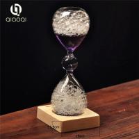 China Creative bubble hourglass with wood base Gifts and Souvenirs for sale