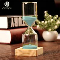China 30mins creative glass hourglass with wooden base for sale