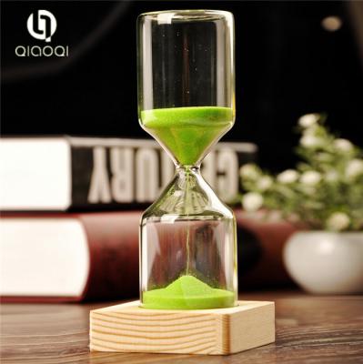China 30mins creative glass hourglass with wooden base for sale