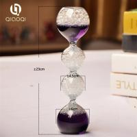 China 2018 hot selling unique liquid bubbles hourglass for kids for sale
