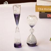 China handmade blown hot selling Oil liquid sand timer birthday gift for sale