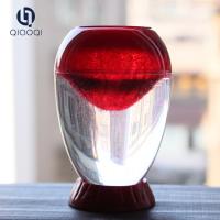 China Decoration Design Different Handcrafted Volcanic eruptions oil Hourglass for sale