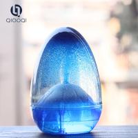 China Decoration Design Different Handcrafted Volcanic eruptions oil Hourglass for sale