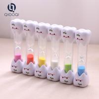 China Factory Good Quality plastic children smile face sand clock timer hourglass for sale