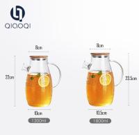 China Best selling decorative cool water jug hand blown 1.8L eco-design borosilicate glass tea pitcher kettles with bamboo lid for sale