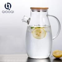 China Best selling decorative cool water jug hand blown 1.8L eco-design borosilicate glass tea pitcher kettles with bamboo lid for sale