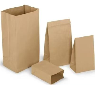 China Die-Cut Handle Kraft Paper Bag – D-Shaped Cut-Out Handle, Square Bottom, 80-140gsm for sale
