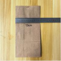 China Die-Cut Handle Kraft Paper Bag – D-Shaped Cut-Out Handle, Square Bottom, 80-140gsm for sale