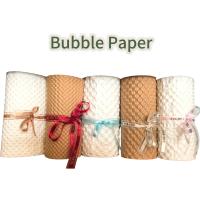 China Embossed Kraft Paper Roll – Roller-Embossed Bubble Cushioning Sheet for Eco Packaging for sale