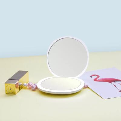 China Hand Travel Pocket Beauty Mirrors LED Purse Folding Makeup 3X Magnifying Custom Cosmetic Desktop Mirror for sale