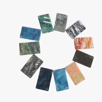China Duke 4x8ft Acrylic Patterned Marble Wood Grain Acrylic Sheet for Interior Decoration for sale